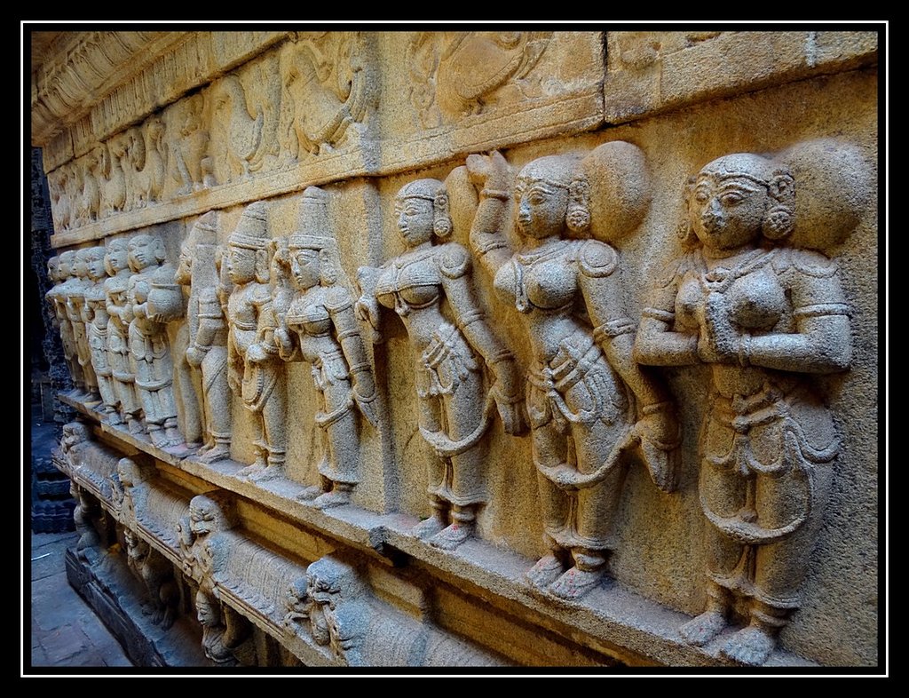 Sculpture on the side walls of the Garbhagriha (inner sanctum sanctorum ...